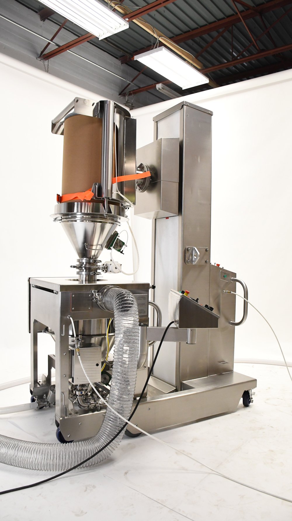 Material Transfer Station with Vacuum Conveyance - Rheo Engineering